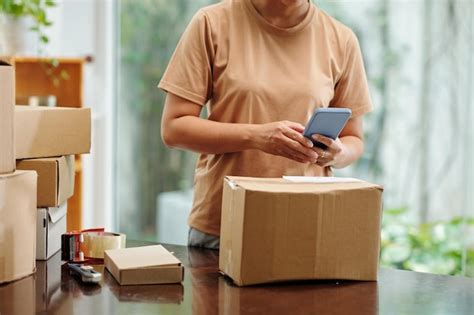 Premium Photo Woman Scanning Code On Parcel