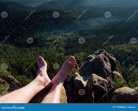 Naked Male Legs Take Rest On Peak Outdoor Activities Stock Photo