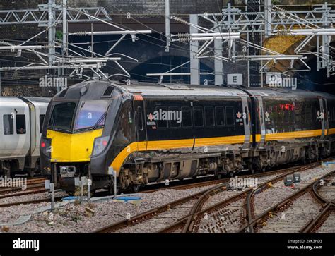 Class 180 Adelante Train In Grand Central Livery At Kings Cross Station London England Stock