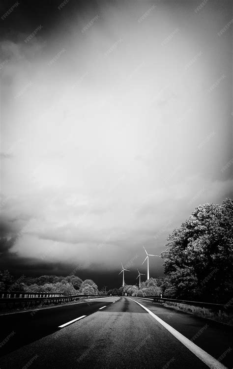 Premium Photo Empty Road Against Cloudy Sky