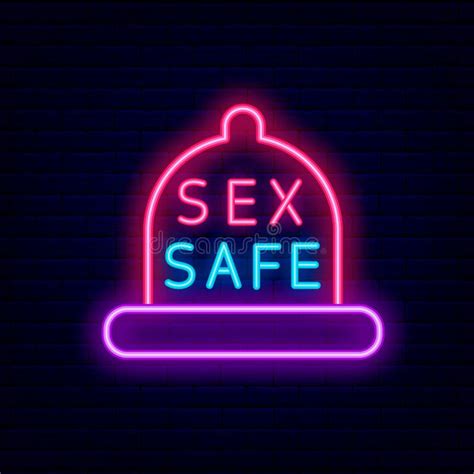 Sex Safe Neon Sign With Condom Frame On Brick Wall Background Contraceptive Advertising