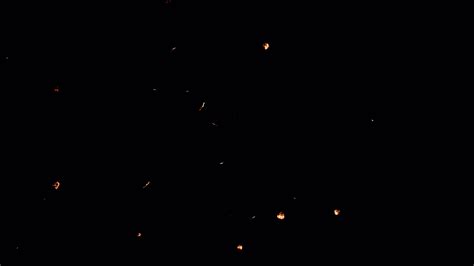 Fire Burn Ash Or Dust Particles Flying And Floating On Air In A Loop