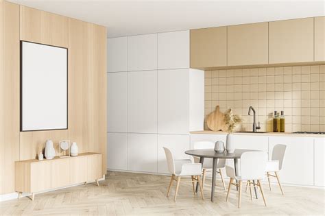 현대적인 주방 인테리어와 스튜디오 아파트의 테이블과 의자가 있는 식사 공간 사이드 보드와 나무 벽에 흰색 빈 액자 포스터 하나 가구 모의 0명에 대한 스톡 사진 및 기타