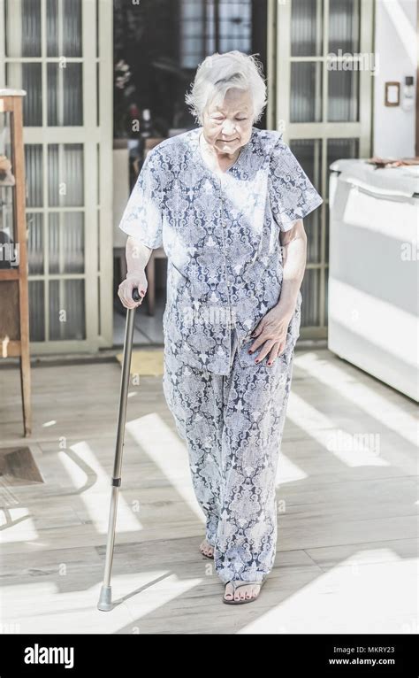 Portrait Of A Obaasan Grandma With Difficulty To Walk Because Of The