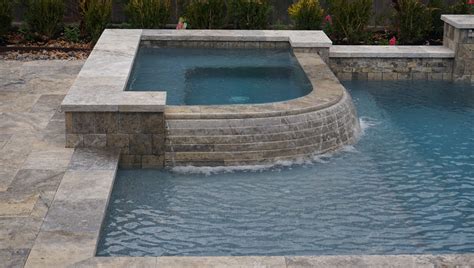 Raised Spa With Stacked Travertine Spillover Custom Pools Pool