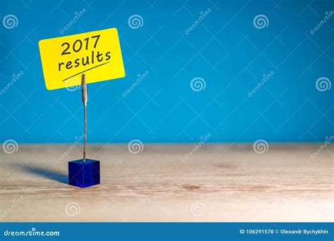 2017 Results Text On A On Note At Blue Background With Empty Space For