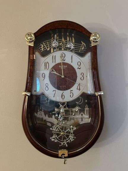 Small World Rhythm Clock Aumann Auctions Inc