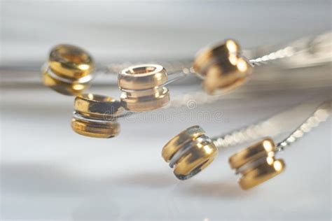 Macro Details Of Strings For Electric Guitar On A White Background