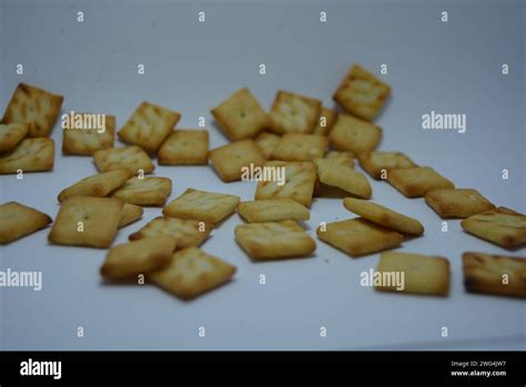 Salty Delicious And Crispy Small Square Crackers Scattered All Over
