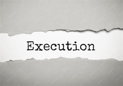 Premium Photo Execution Word On The Torn Paper Business Concept