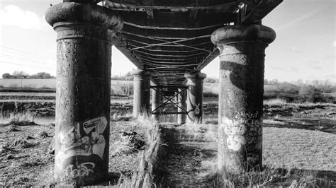 Premium Photo Bridge Over Field