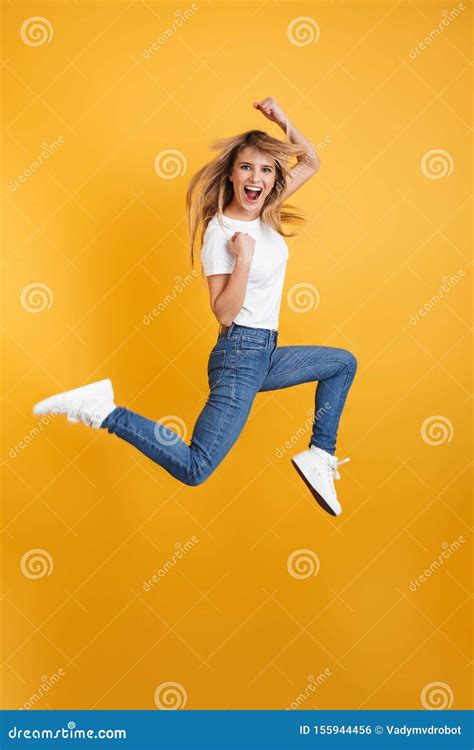 Emotional Screaming Positive Young Blonde Woman Jumping Isolated Over