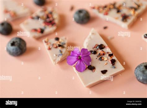 Crushed Pink Chocolate With Blueberries And Flowers Broken Bars With