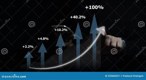 Business Man Holding Tablet And Showing Holographic Graphs And Stock
