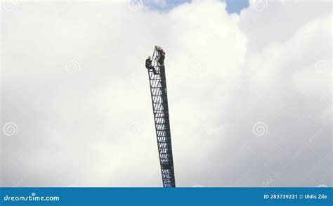 Workers Seting Up Crane In Big Ncept Of Dangerous Work Stock