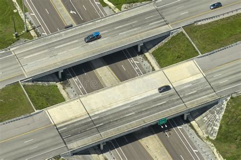 Aerial View Of Freeway Overpass Junction With Fast Moving Traffic Cars