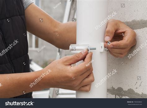 Construction Worker Installs Pipe Gutter System Stock Photo Shutterstock