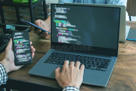 Blur Soft Focus Group Developer Programming And Coding Technology Smartphone And Computer