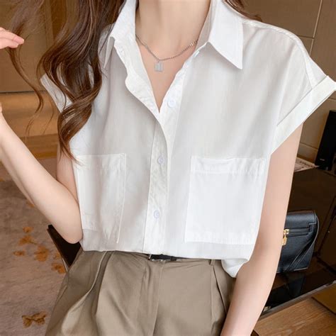 เสื้อแขนกุดกระเป๋าหลวม เสื้อเชิ้ตแขนสั้นผู้หญิงใหม่อ่อนโยน เสื้อฤดูร้อนของผู้หญิง ความเยาว์