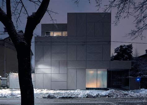 Ofis Arhitekti Adds Grid Of Crosses To Facade Of Ljubljana House