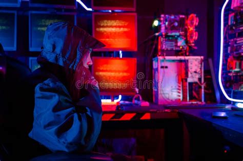Woman Hacker Wear Hood Sit Front Computer Typing On Keyboard Hacking