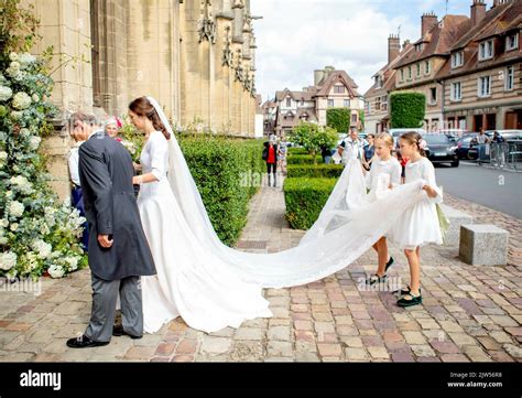 Caroline Philippe And Her Father Arrive At The Eglise Saint Michel In Pont L Eveque On