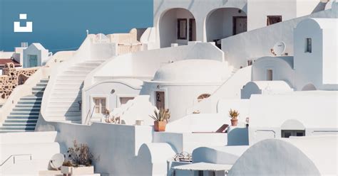 갈색과 흰색 풍차 사진 Unsplash의 무료 그리스 이미지