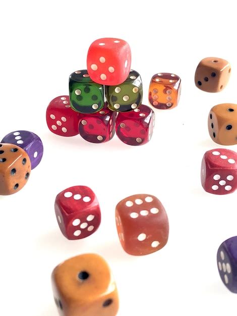 Premium Photo Close Up Of Colorful Dice Over White Background