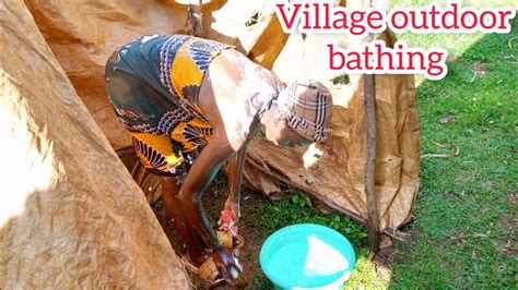 African Village Lifebathing In An Outdoor Bathroom Youtube