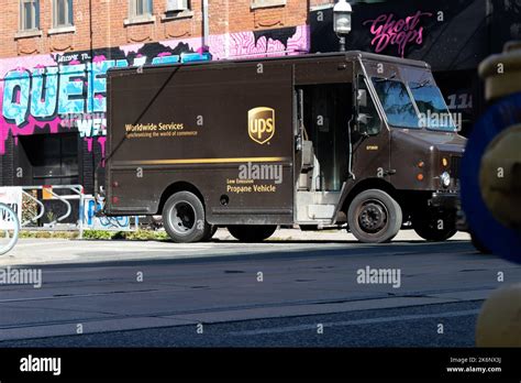 A Brown Ups Delivery Van On A Sunny Day In Toronto United Parcel Service Is The Worlds Largest