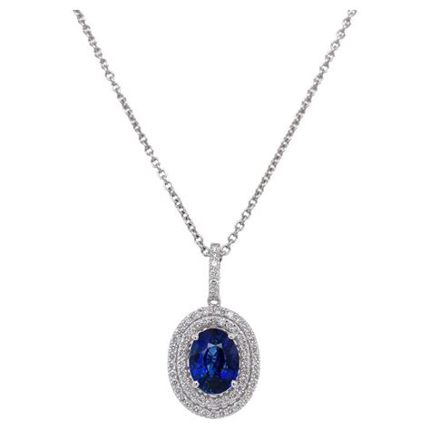 Oval Sapphire And Diamond Double Halo Pendant For Sale At 1stdibs