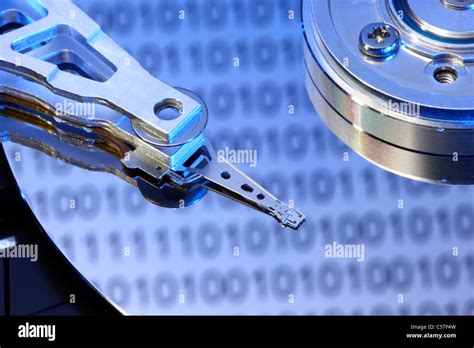 Computer Hard Drive Opened Writing Reading Head And Hard Disk Binary Code Numbers Are