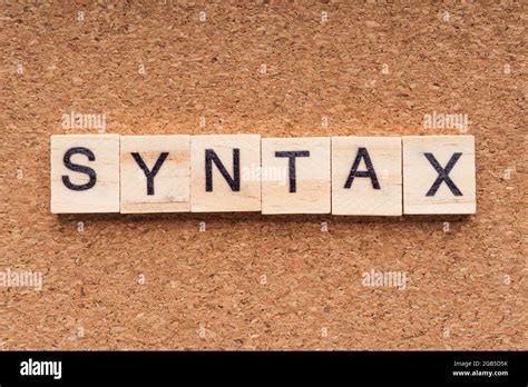 SYNTAX Word Written On Wood Block SYNTAX Text On Wooden Table