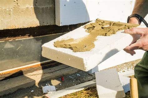 Installing Rigid Styrofoam Insulation Board For Energy Saving Of The