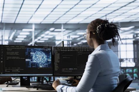 Engineer Working At Pc Desk Doing Checkup On Ai Server Room Stock Image Image Of Task