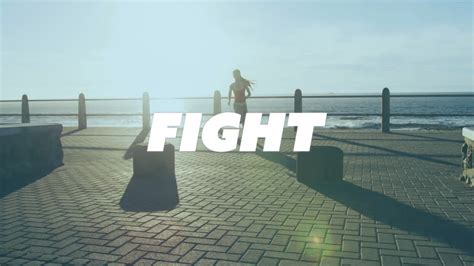 Premium Stock Video Running Along Seaside Promenade Text Animation Fight Over Scene