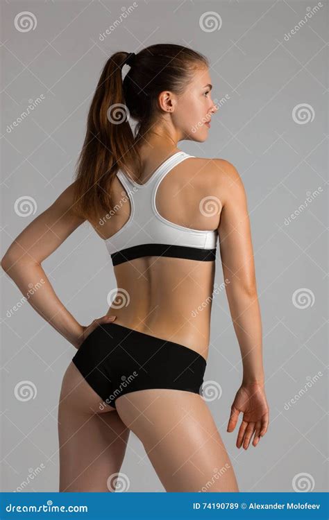 Beautiful Super Fit Young Woman Showing Off Her Perfect Muscular Body