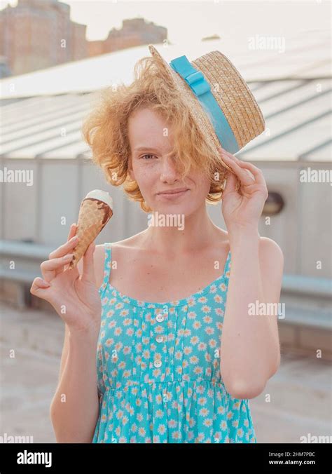 Young Happy Cheerful Curly Redhead Woman In Straw Hat Blue Sundress