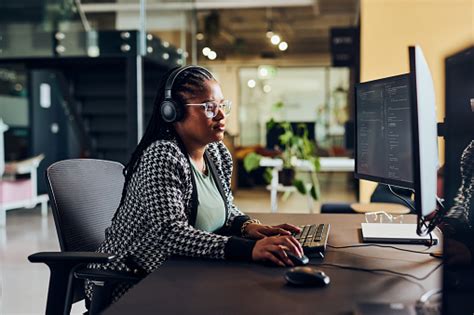 Computer Programmer Coding Artificial Intelligence In Modern Office