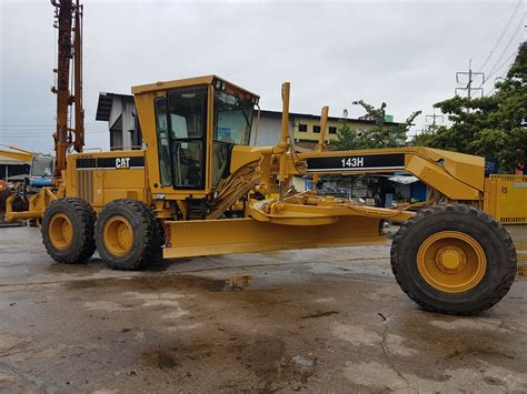 รถเกรด Caterpillar 143 H เครื่องจักรกลหนักคุณภาพ
