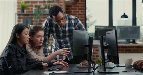 mixed team of programmers brainstorming ideas for new cloud computing