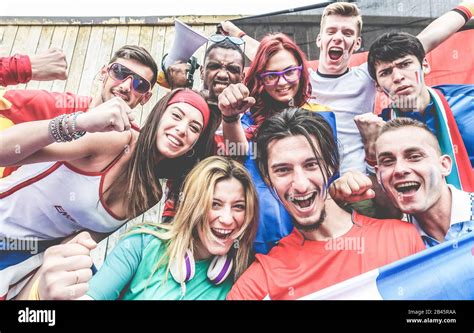 Happy Sport Supporters Having Fun During Football World Game Young