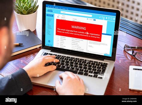 Email Attachments Warning Message On A Laptop Screen Computer Virus And Antivirus Cyber