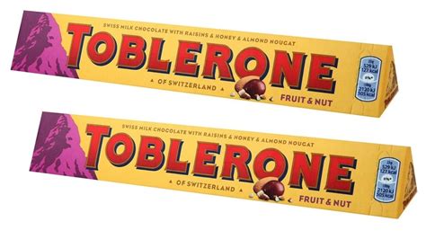 Toblerone Молочный шоколад Toblerone Fruit And Nut с медово миндальной нугой и изюмом 100 гр