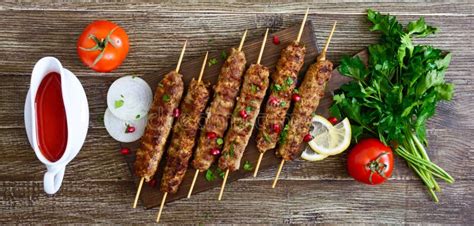 Delicious Lula Kebab On A Wooden Table Chopped Meat On Wooden Skewers Grilled Eastern Cuisine