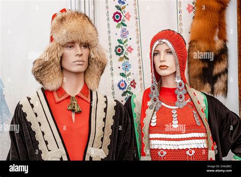Traditional Bashkir National Costumes With Monists Made Of Ancient Coins And Bright Red Fabric