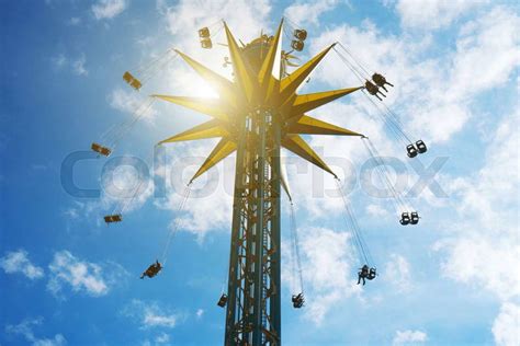 Flying Swinging High Chained Carousel In Amusement Park Colourbox