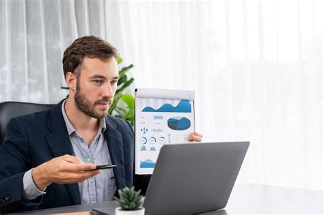 Premium Photo Businessman In Black Suit Present Financial Data To