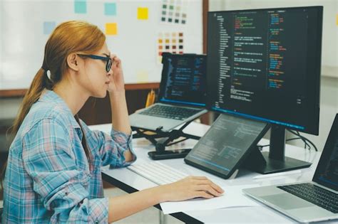 Premium Photo Young Woman Covering Her Face With The Stress Of Work Coding And Programming