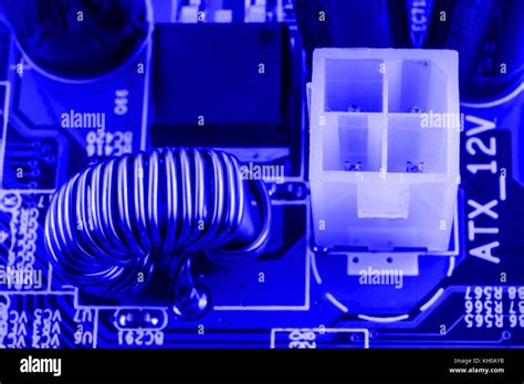 Integrated Semiconductor Microchip On Blue Circuit Board Representative Of The High Tech